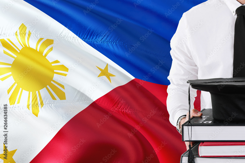 Successful Filipino student education concept. Holding books and ...