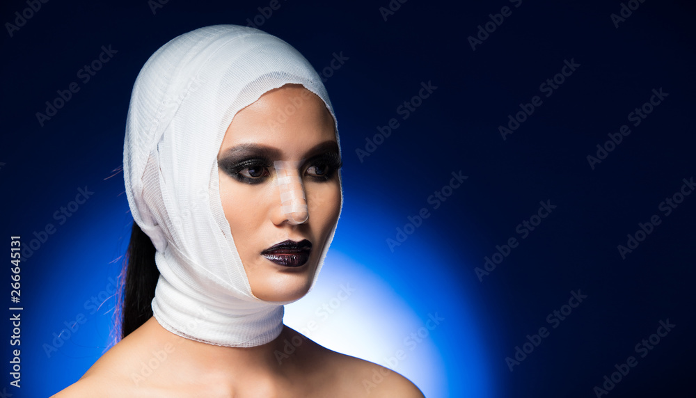 Asian Tan Skin Woman with Bandage around head after brain beauty ...