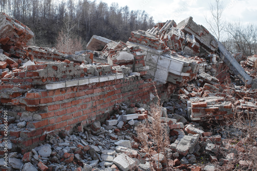 The ruins of a brick house. The house is destroyed, a natural disaster ...