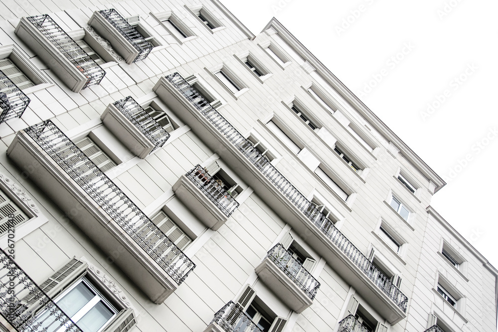 White facade of a tall building in a city. Real State concept with ...