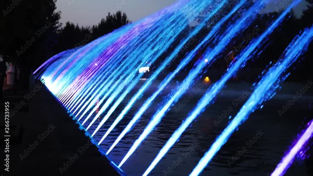 Night colorful city fountain with light effect in the resort city of ...