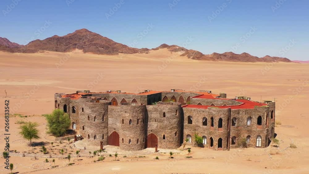 Video „Aerial of the spectacular Le Mirage Resort lodge hotel castle ...