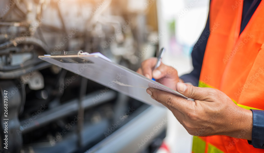 Preforming a pre-trip inspection on a truck,Concept preventive ...
