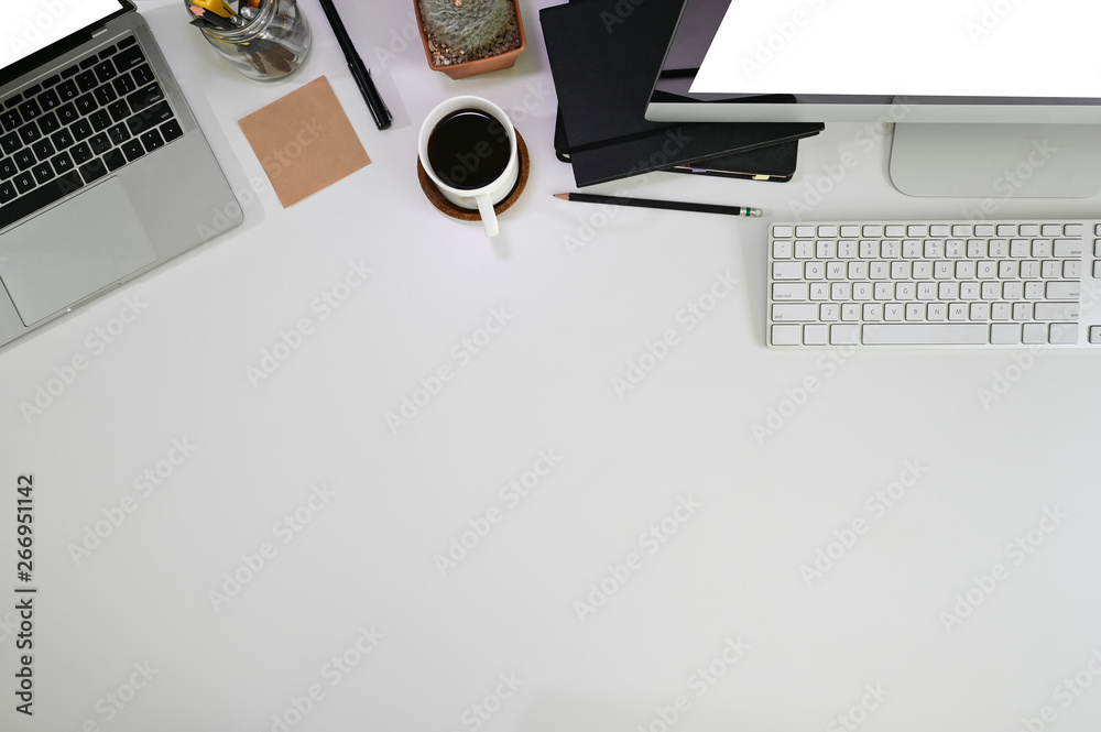 Office desk with top view, Laptop and PC empty screen with coffee and ...