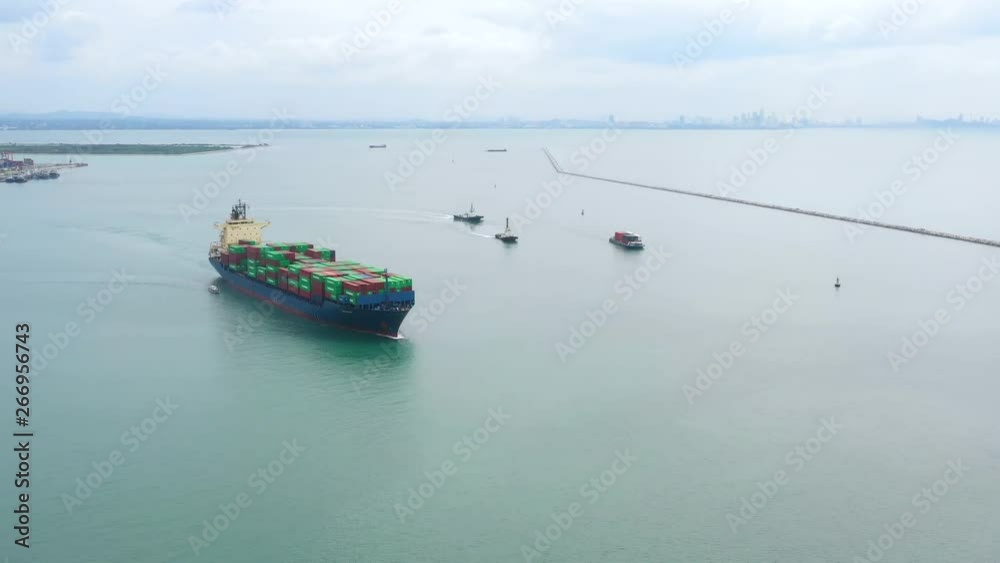 Video Container ship in export and import business logistics and ...