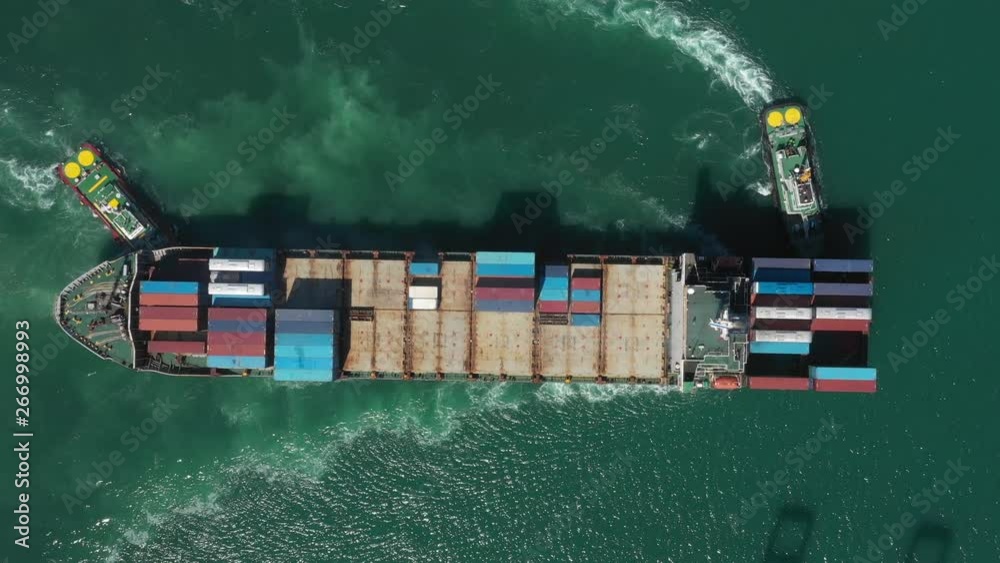 Video Container ship in export and import business logistics and ...