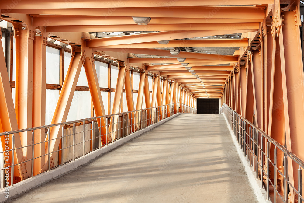 Orange Metal Construction Of Pedestrian Overpass. Pedestrian Bridge ...