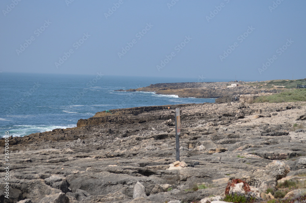 Stone Beach Near Fort Of Saint George Of Octaves In Cascais. Photograph ...