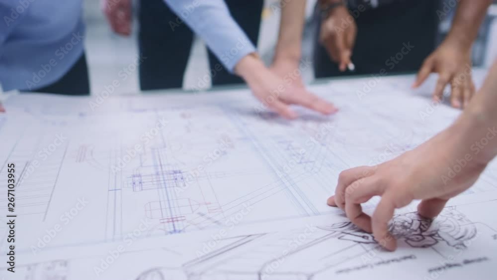 In the Industrial Engineering Facility: Diverse Group of Engineers and ...