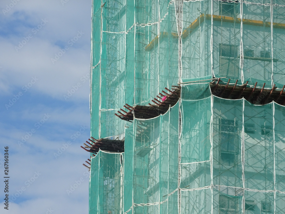 Catch platform and safety netting at the face of the building during ...