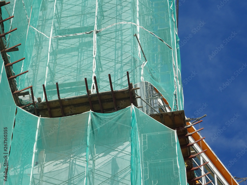 Catch platform and safety netting at the face of the building during ...