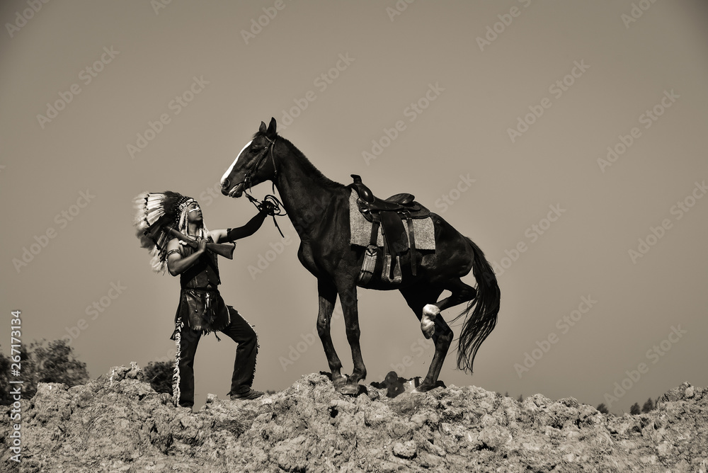 Ancient photos of red Indians, along with horses and guns in his hand ...