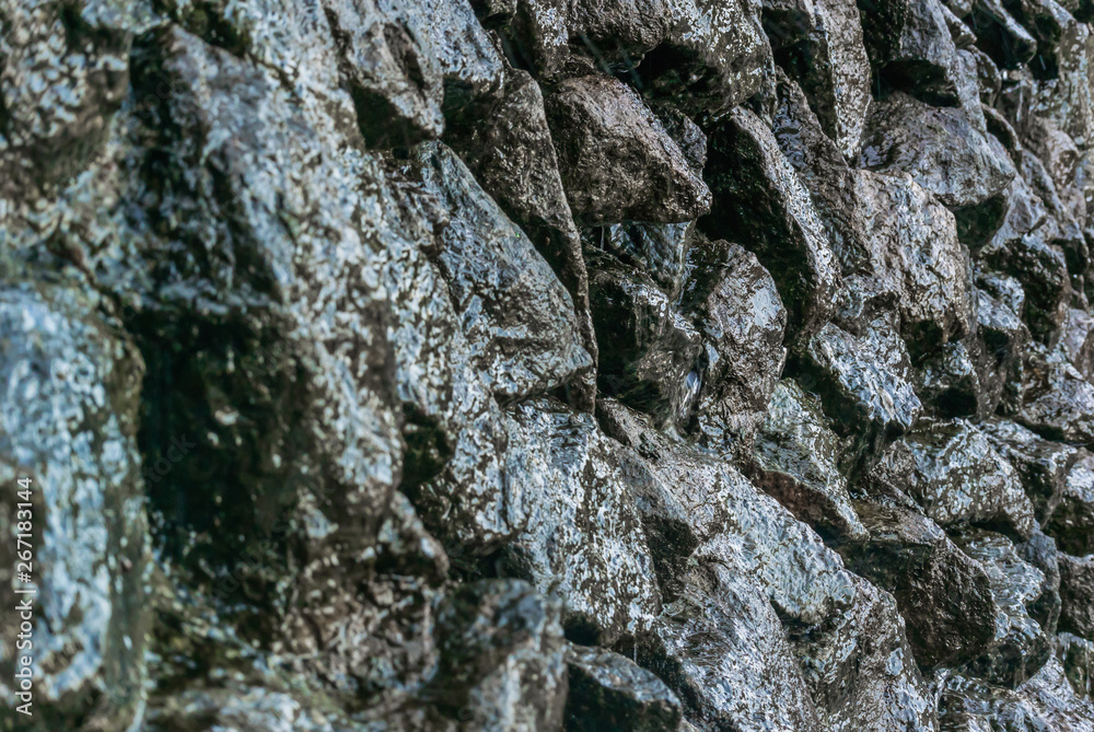 Large, rough stones that resemble the part of the rock through which ...