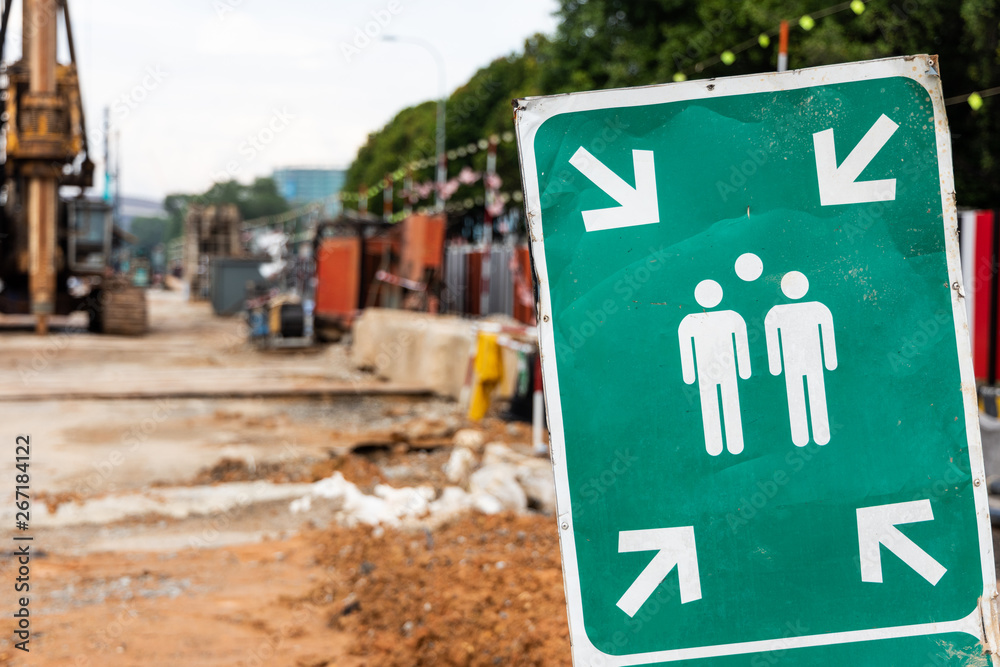 Assembly Point signage with construction site background Stock Photo ...