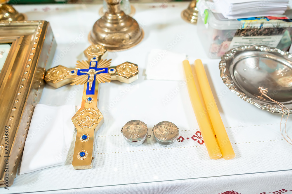 Holy water and oil for unction in a Catholic Church. Baptism oil in a ...