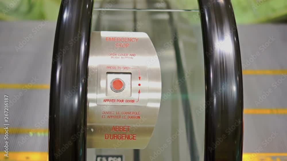 Emergency stop button on escalator. A safety feature of modern ...