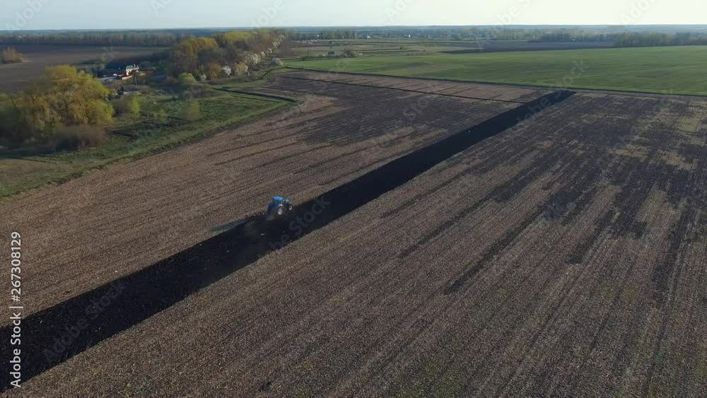 Agriculture. Agronomy and agribusiness. Spring field work. Tractor ...