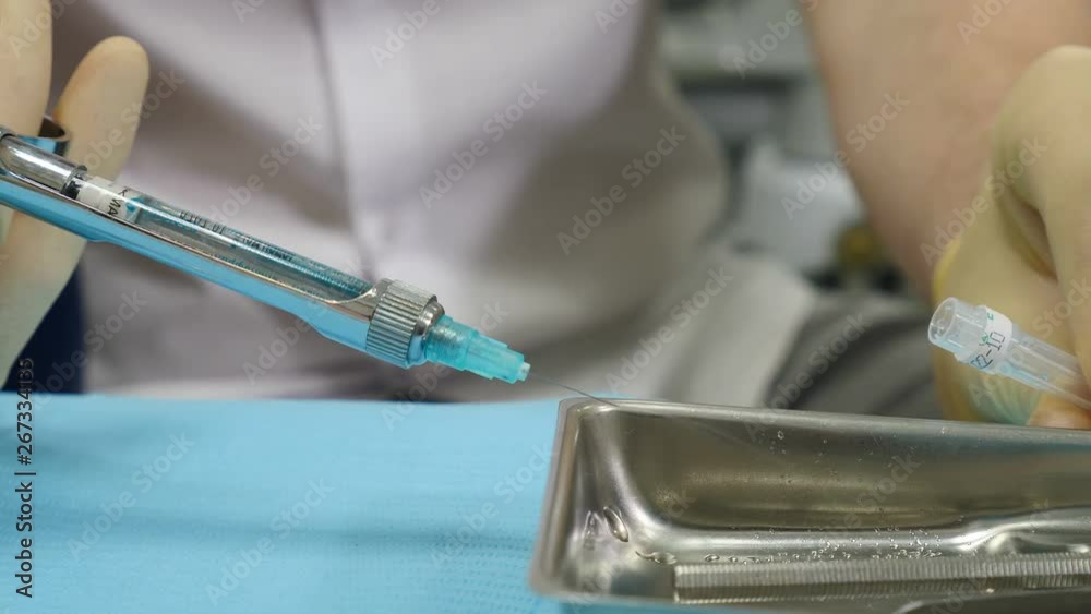 Dental syringe full of anesthesia close-up. Injections to prevent pain ...