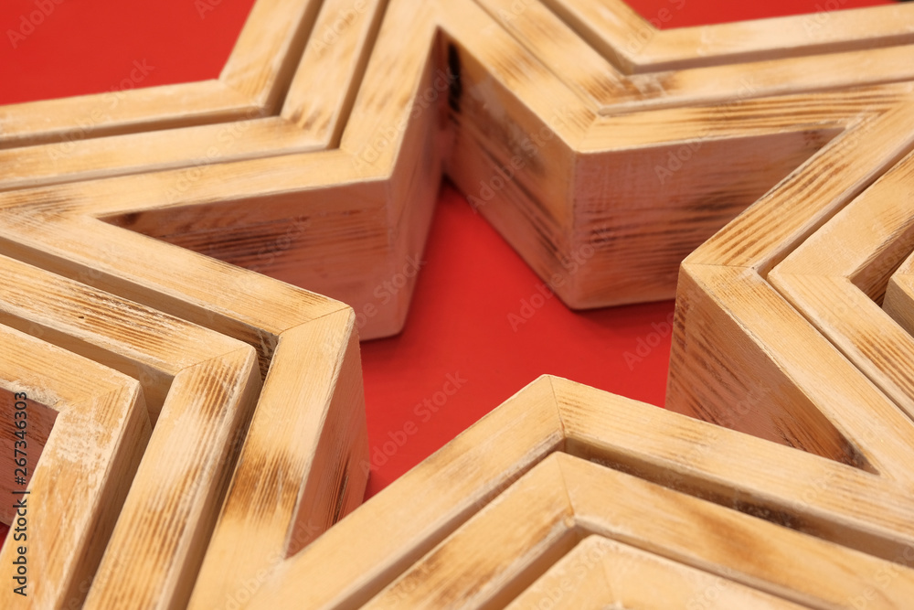 Star, the wooden figure. Three star shapes stacked together like a ...