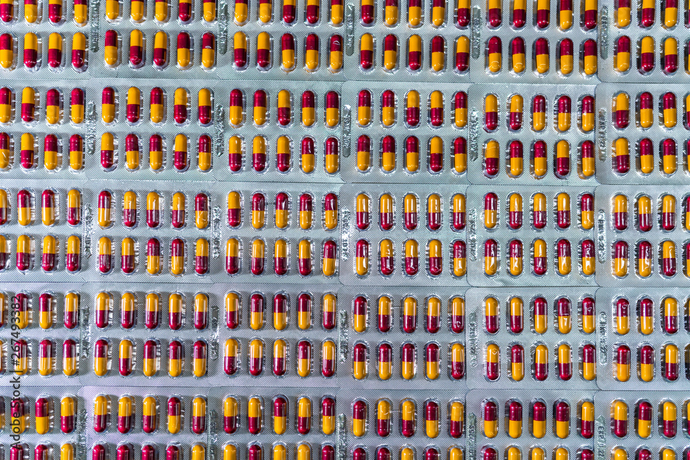 Antibiotic capsule pills in blister pack at production line of ...