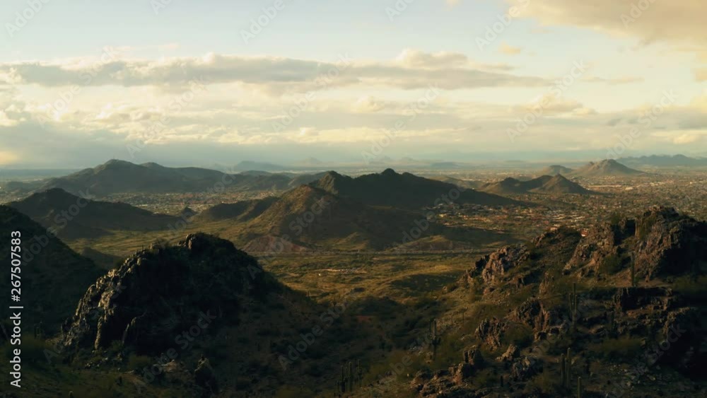 The aerial camera flies over the gorgeous rocky peaks of the Phoenix ...