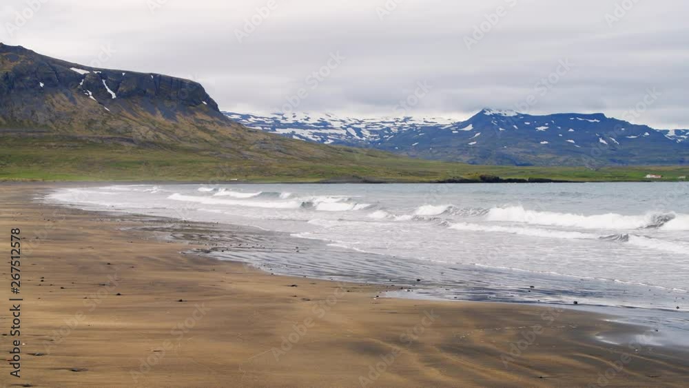 Landscape view near Grundarfjordur with sand rocky beach fjord cliff ...