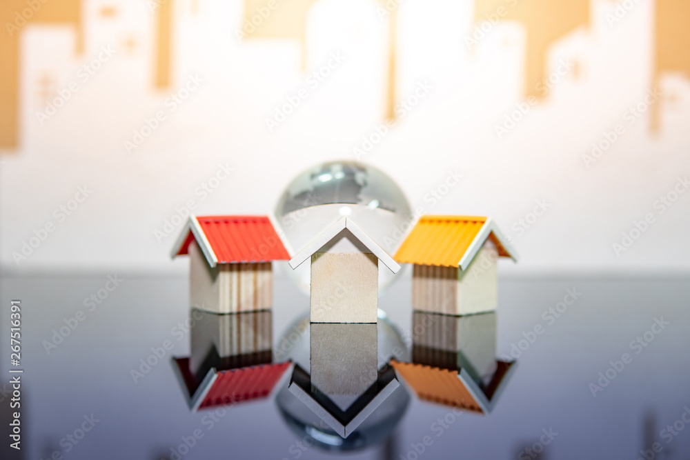 Global real estate or property investment concept. Wooden house models ...