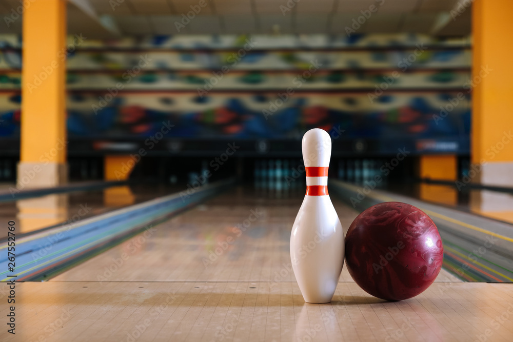 Pin and ball on floor in bowling club Stock Photo | Adobe Stock