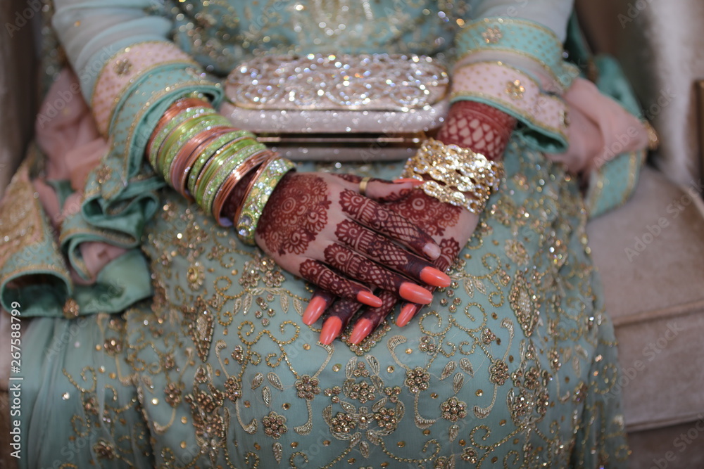 Bride hands with mehndi hina on wedding day. Beautiful hands with ...