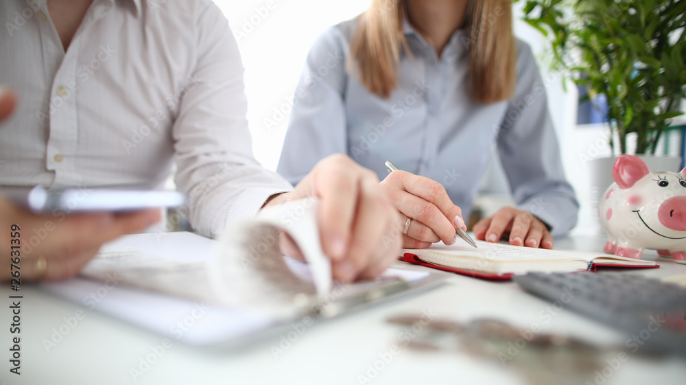 Young family man and woman checking Stock Photo | Adobe Stock