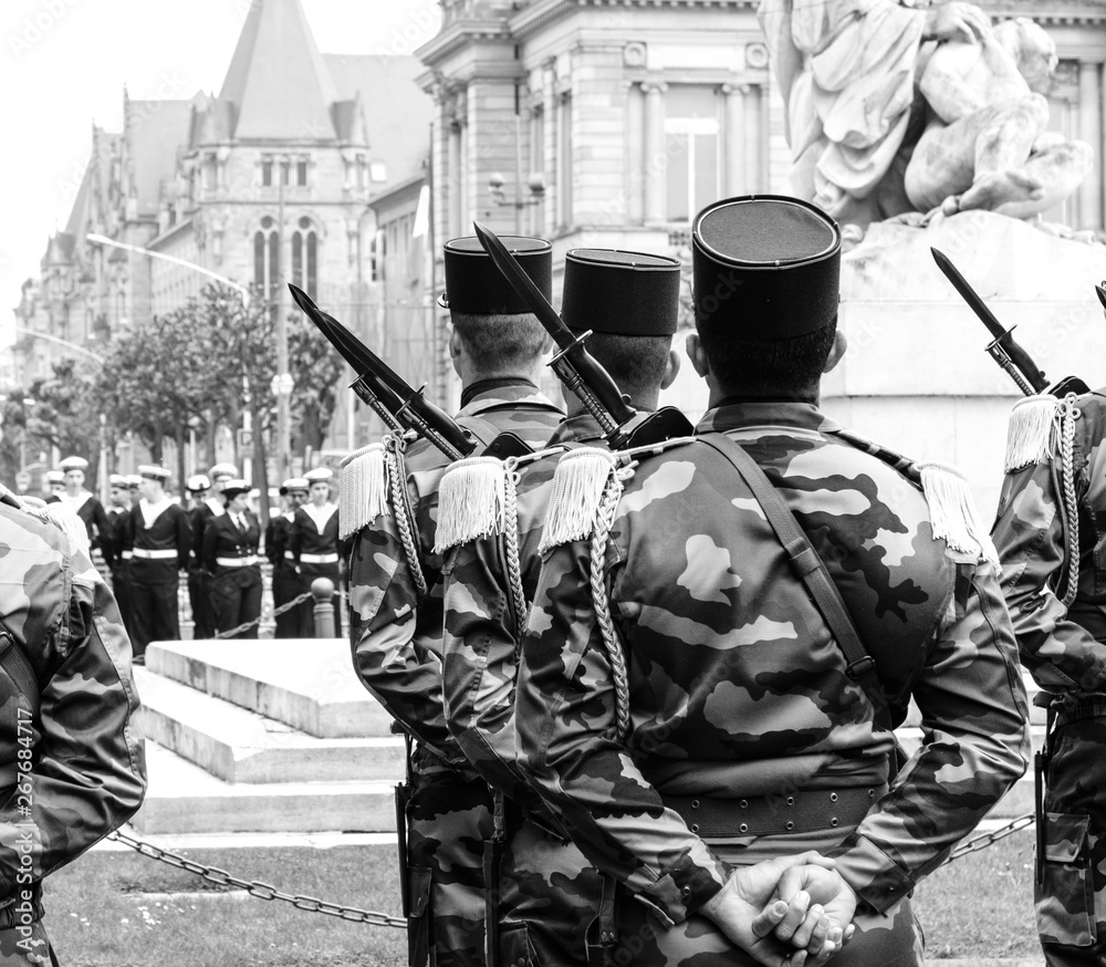 Rear view of soldiers at ceremony to mark Western allies World War Two ...