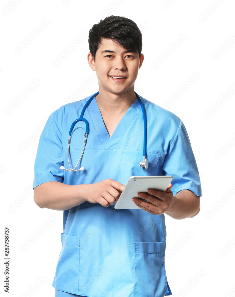 Portrait of male medical assistant with tablet computer on white ...