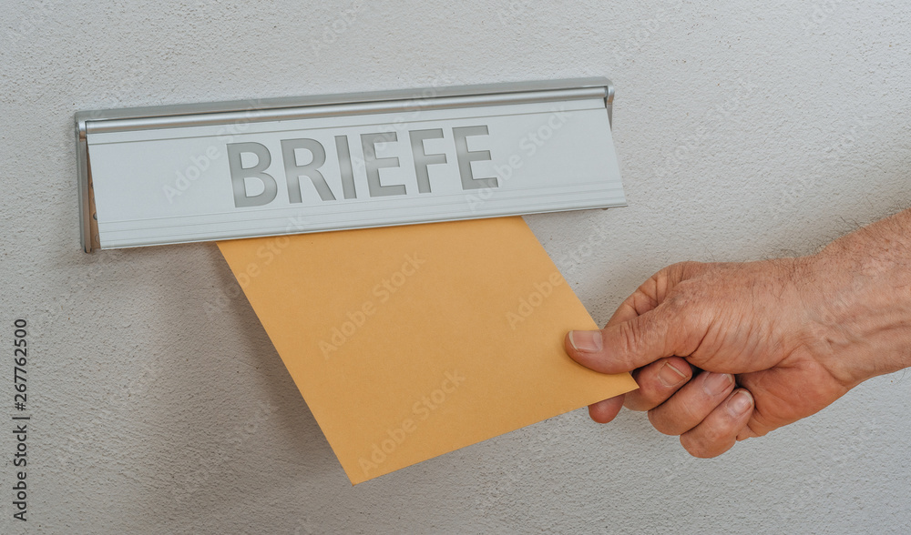 Briefeinwurf mit der Beschriftung Briefe Stock Photo | Adobe Stock