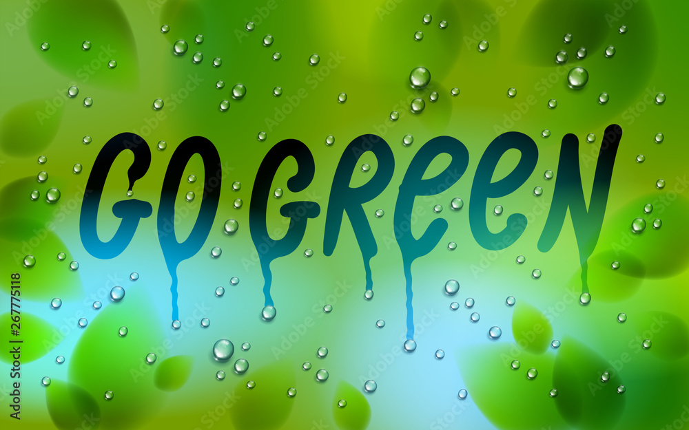 Go green words drawn on a window, fresh green leaves and water rain ...