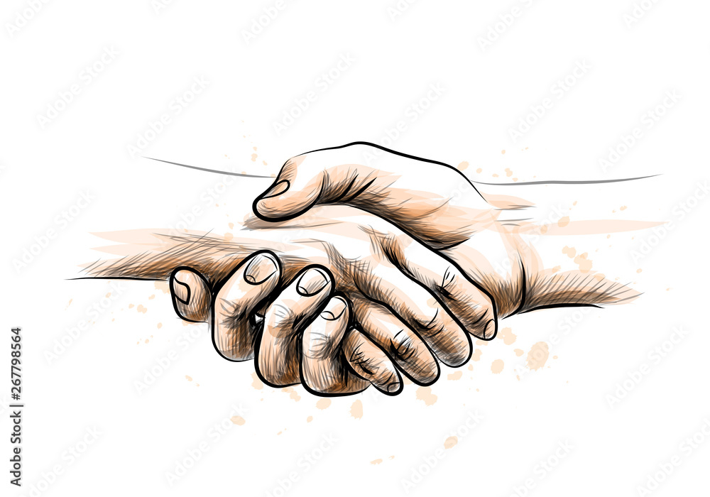 Human hands are joined by a handshake in a gesture of agreement ...