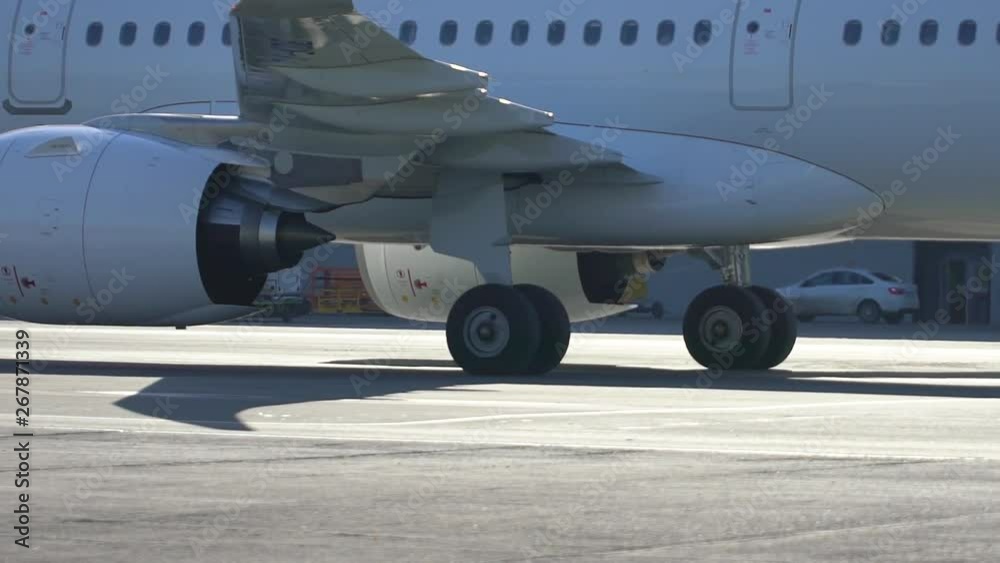 Jet turbine engine of aircraft on runway in airport. Working jet engine ...