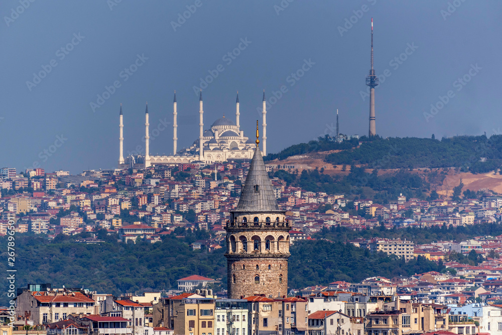 Galata Tower and behind of Great Camlica Mosque Stock Photo | Adobe Stock