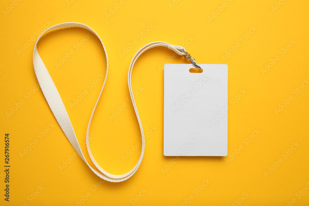 Tag id pass, plastic identification on yellow background. White blank ...