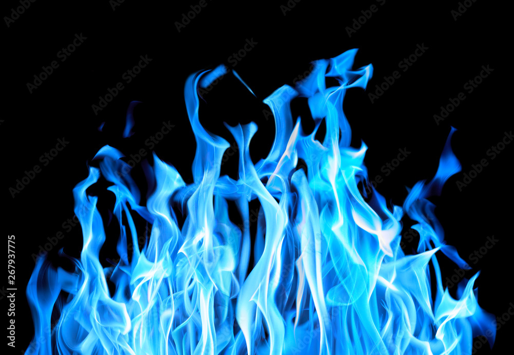 blue sparks of bright large flame on blacl Stock Photo | Adobe Stock