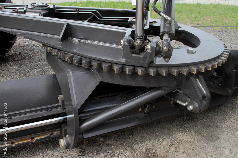 The massive gear of the rotary mechanism of the blade on a tractor ...