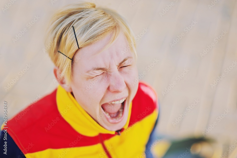 Beautiful screaming woman, sad face expression emotion. A portrait of ...