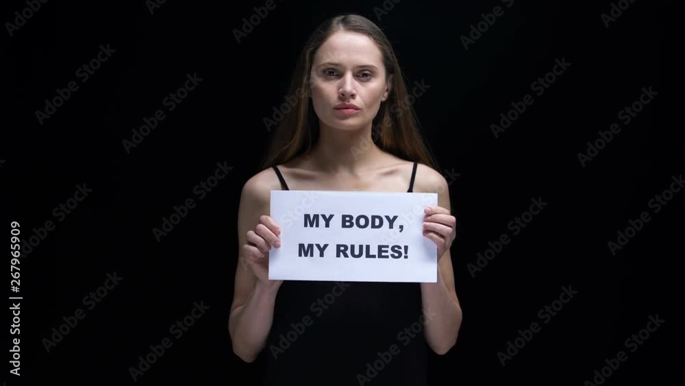 Woman showing my body my rules sign, accepting individual imperfections ...