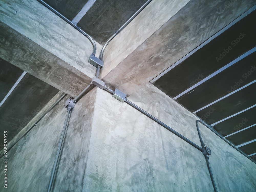 detail of a building, The electrical wiring of the pipe is attached to ...