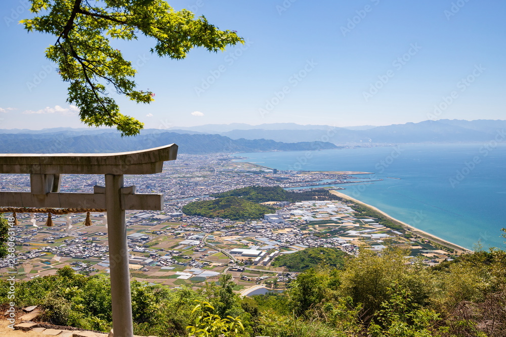 Japanese torii gate and landscape of Kanonji city on the seto inland ...