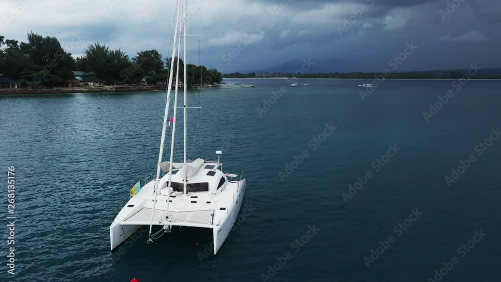 CLOSE UP, Top view of the boat. Aerial View of a Anchored Catamaran ...