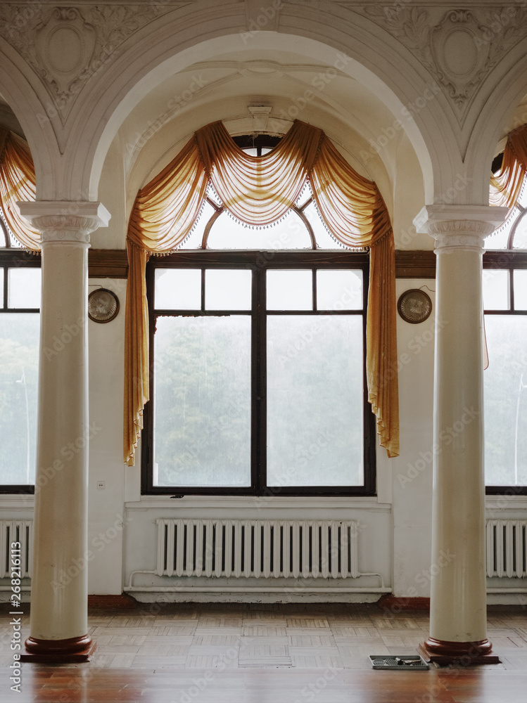 Architectural archway with columns and window Stock Photo | Adobe Stock