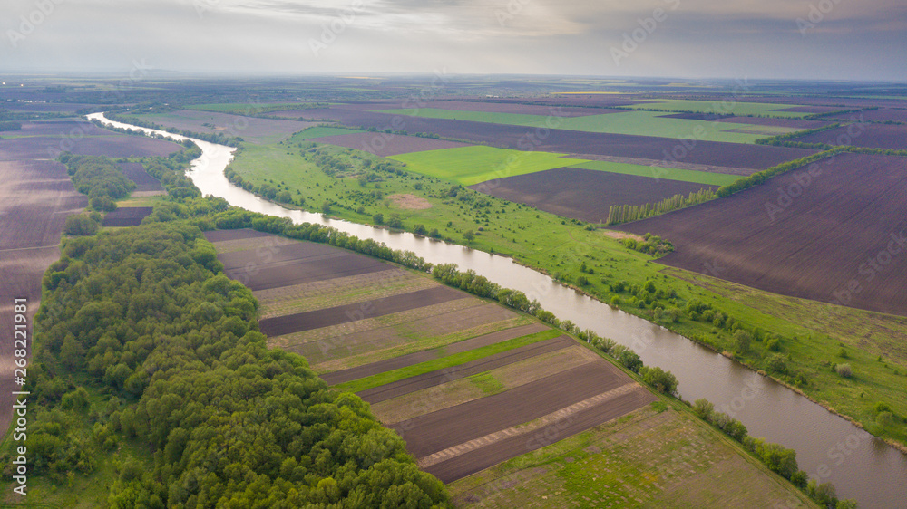 River and fields top view. Photographed from the drone. Beautiful view ...