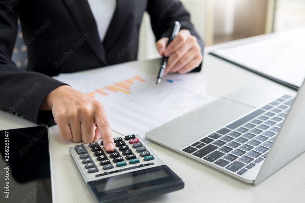 business woman with laptop, Business team working on a new business ...
