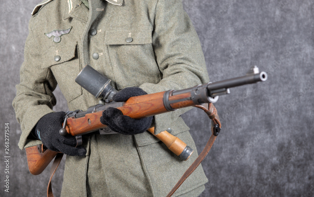 WW II German soldier with rifle and grenade Stock Photo | Adobe Stock