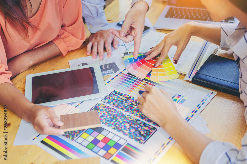 Team designer working graphic with color chart, choosing color and ...